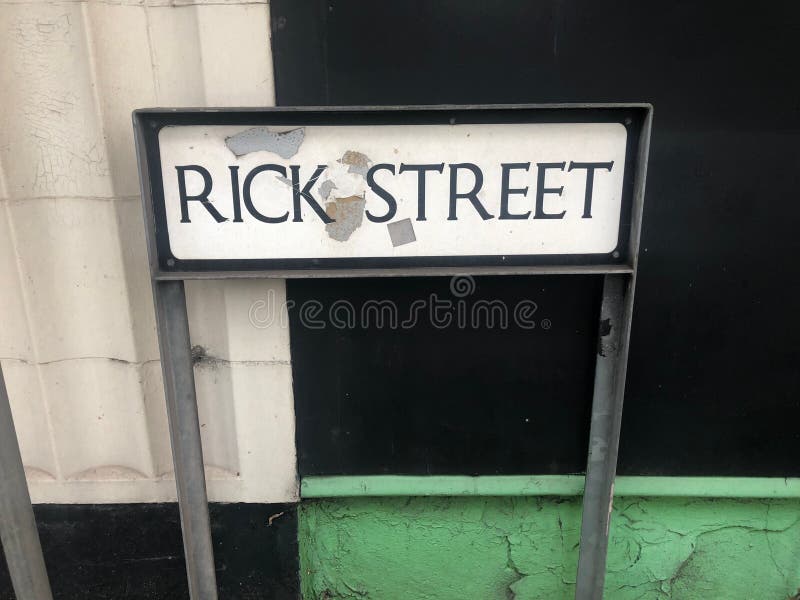 Rick Street Sign by a Wall stock photo. Image of britain - 257727788