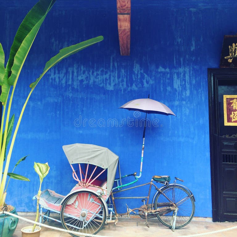 Old Rickshaw in Front of Blue House Stock Photo - Image of ...