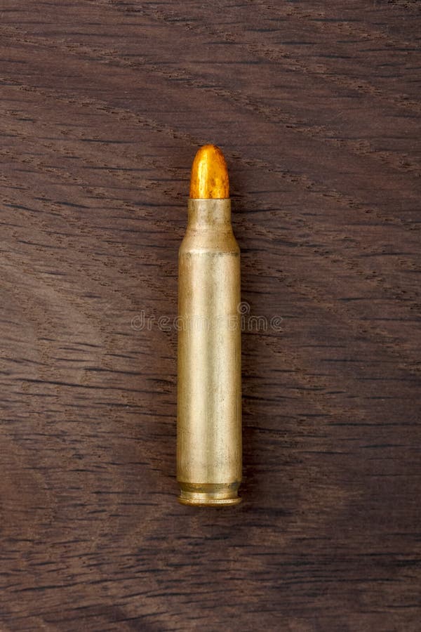 Old Rifle Bullet on the Old Wooden Desk. Stock Photo - Image of armed ...