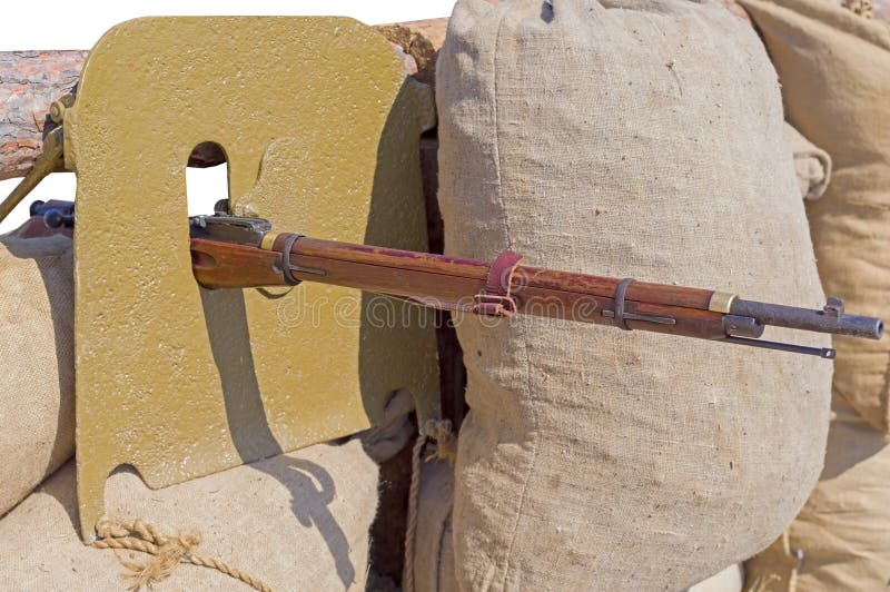 Old rifle with a shield stock image. Image of military - 160996435