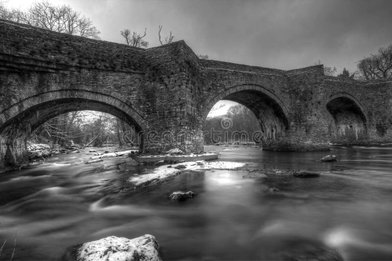 Old river crossing stock image. Image of flowing, bridge - 23229931