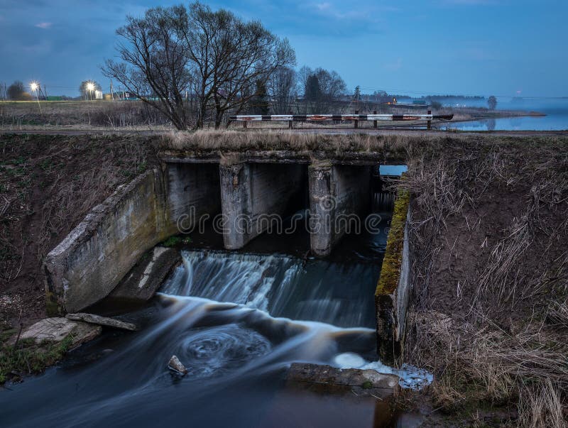Old River Dam in the Evening. Water Blurred by Long Exposure Stock ...