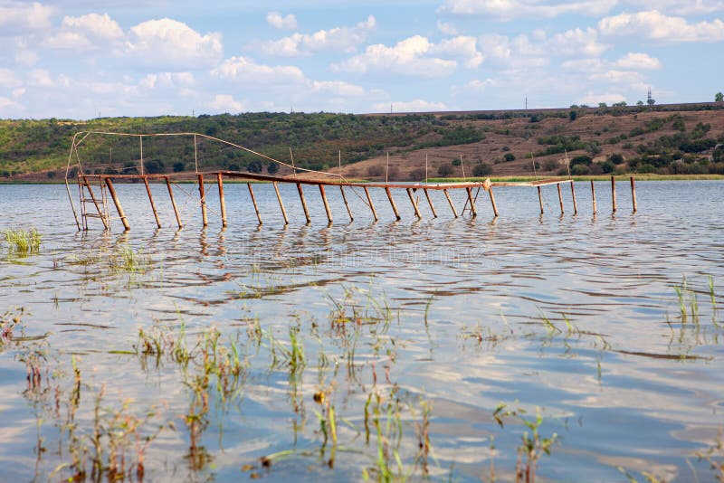 Old river pier stock photo. Image of scenic, shoreline - 196715820