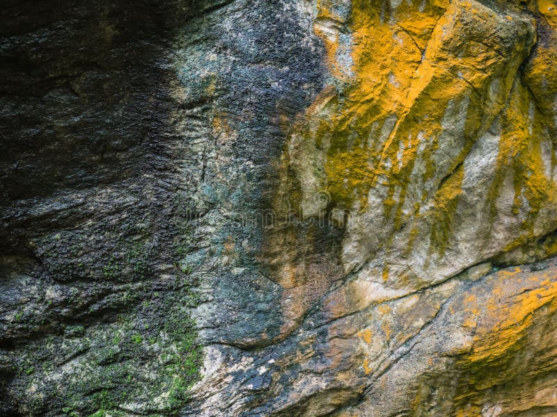 Old Rock with Vertical Colour Split Stock Photo - Image of yellow ...
