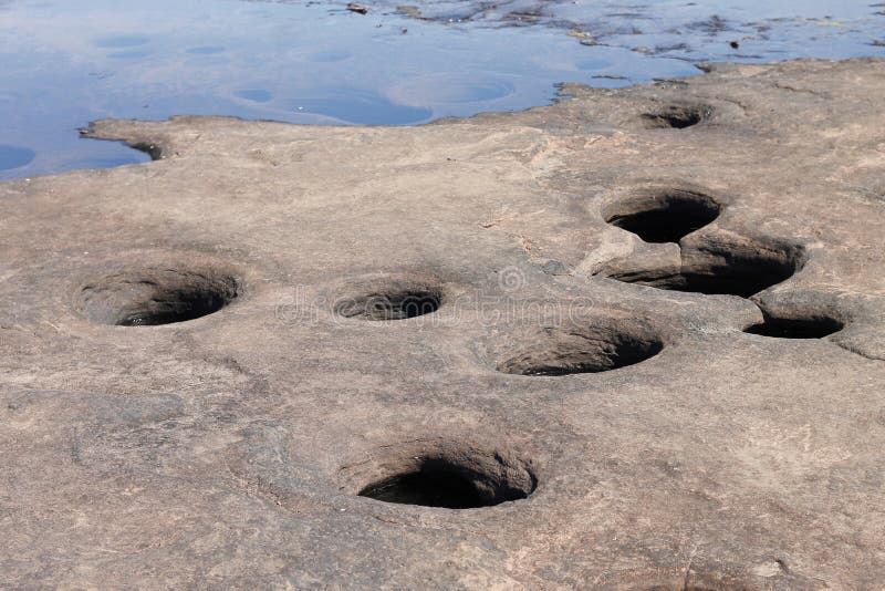 Old rocks with holes stock image. Image of waves, dawn - 63622863