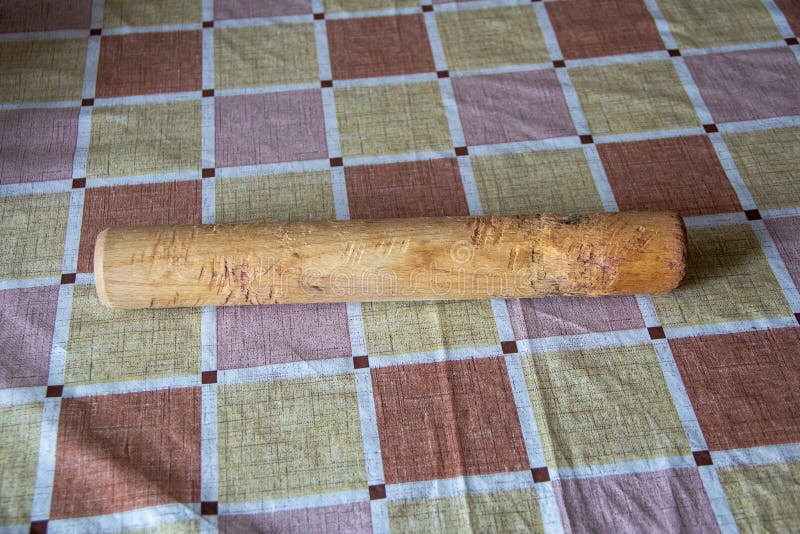 Old rolling pin on a table stock photo. Image of cooking - 207211172