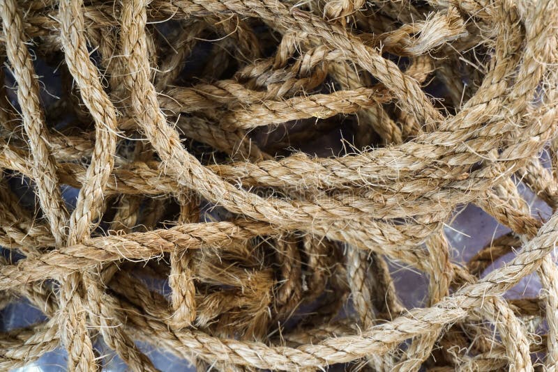 Old rope on the ground stock photo. Image of weathered - 102521808