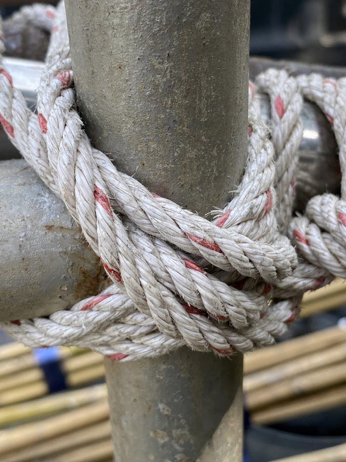 Old rope on iron pipe stock image. Image of sailing - 278361851