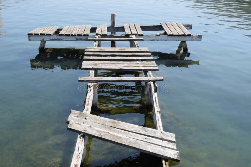 Old Rotten Boat Bridge in a Ghost Town Stock Image - Image of blue ...
