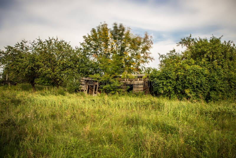 Old Rotten House in a Meadow Stock Image - Image of rotten, ruins: 76989917