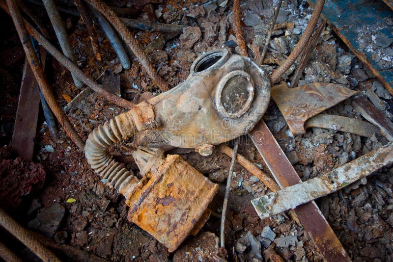Old Rotten Soviet Gas Mask with Rusty Filter on Rusty Metal Floor of ...