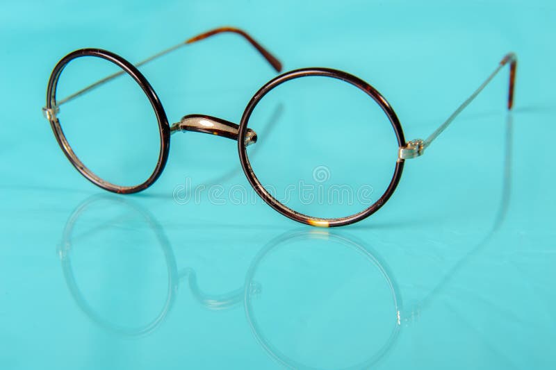 Old Round Glasses On Reflective Ground Stock Photo - Image of circle ...