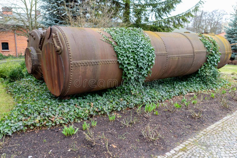Old Round Rusty Liquid Containers. Metal Barrels in a Distillery Stock ...