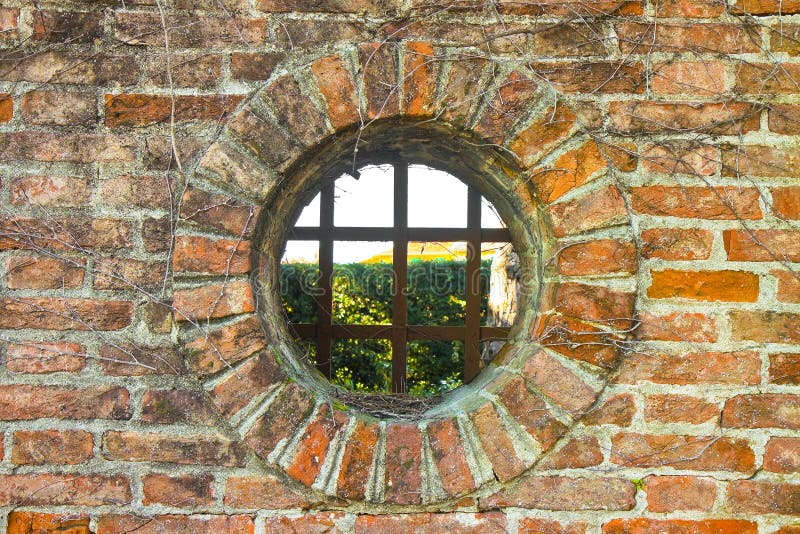 Old Round Window on Brick Wall Stock Photo - Image of closed, weathered ...