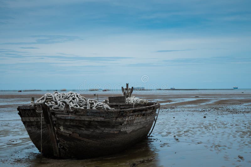 An Old Rowing Boat in Need of Repair on the Beach Stock Photo - Image ...