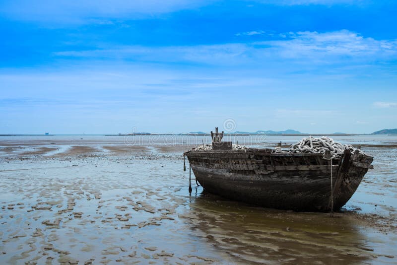 An Old Rowing Boat in Need of Repair on the Beach Stock Photo - Image ...