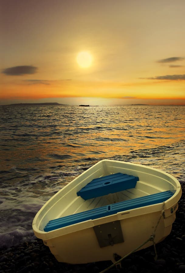 Old Rowing Boat and Sunset. Stock Image - Image of warm, idyllic: 9035281
