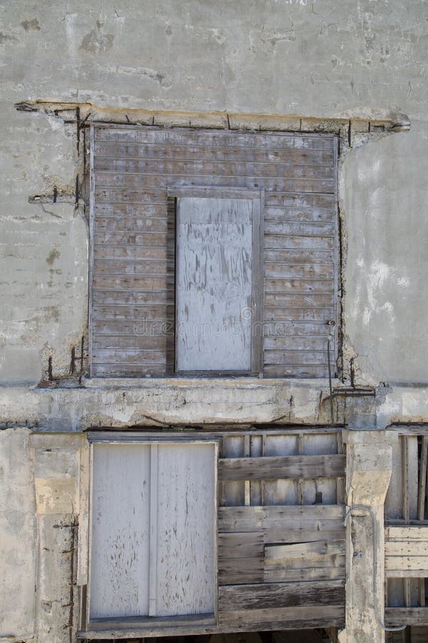 Old Rundown Warehouse Wall Two Wood Doors Stock Photos - Free & Royalty ...