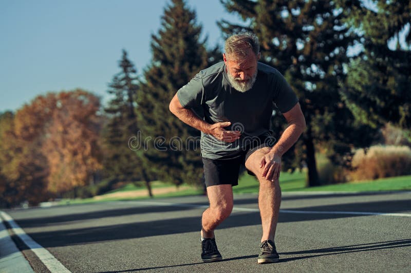 The Old Runner Feeling Bad while Jogging. Stock Image - Image of pain ...