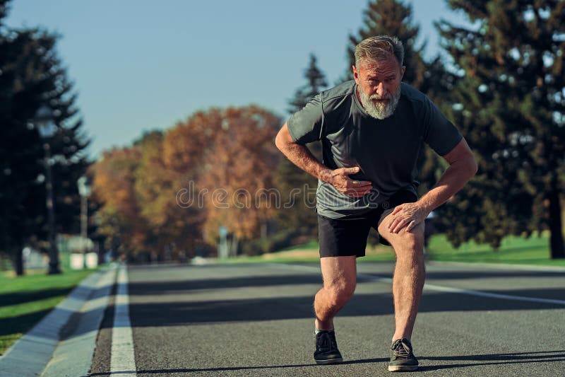 The Old Runner Feeling Bad while Jogging. Stock Image - Image of aged ...