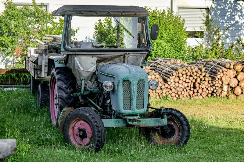 Old Rural Tractor with a Trailer and Firewood Stock Image - Image of ...