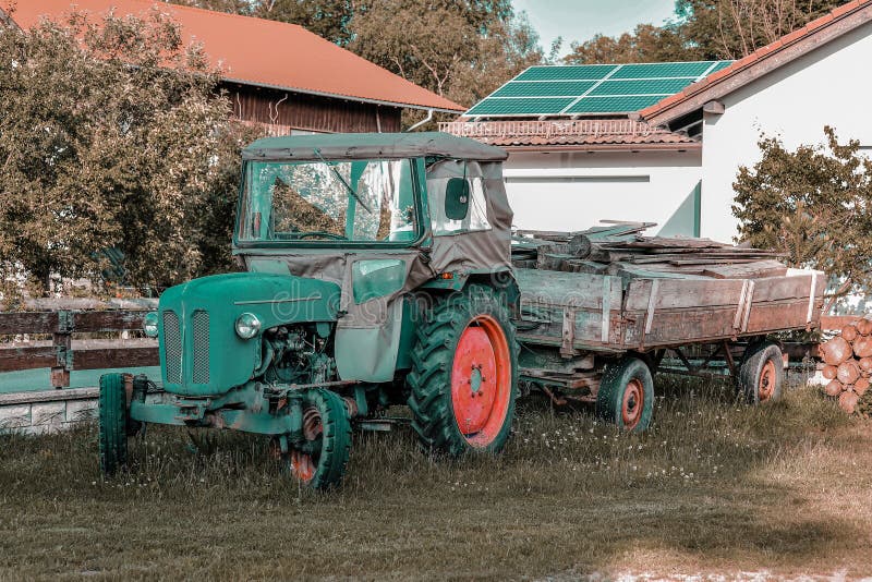 Old Rural Tractor with a Trailer and Firewood Stock Photo - Image of ...