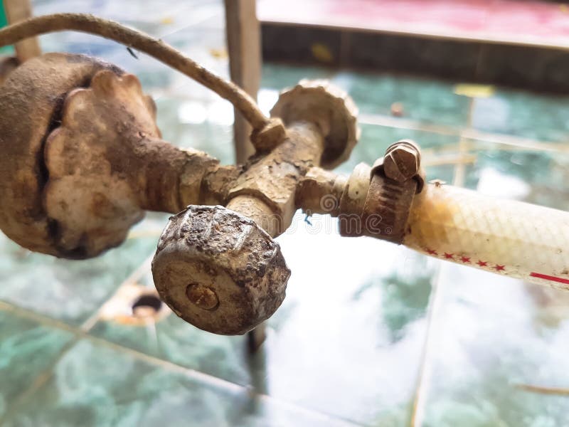 Old Rust Head Valve with Old White Rubber Gas Pipe Stock Image - Image ...