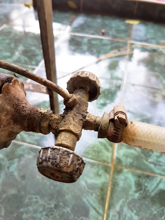 Old Rust Head Valve with Old White Rubber Gas Pipe Stock Image - Image ...