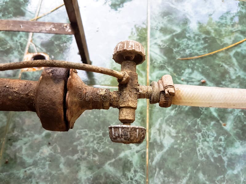 Old Rust Head Valve with Old White Rubber Gas Pipe Stock Image - Image ...