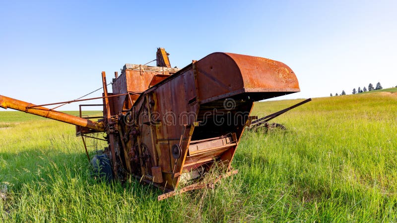 Old Rusted Combine in a Grass Field Stock Image - Image of agriculture ...