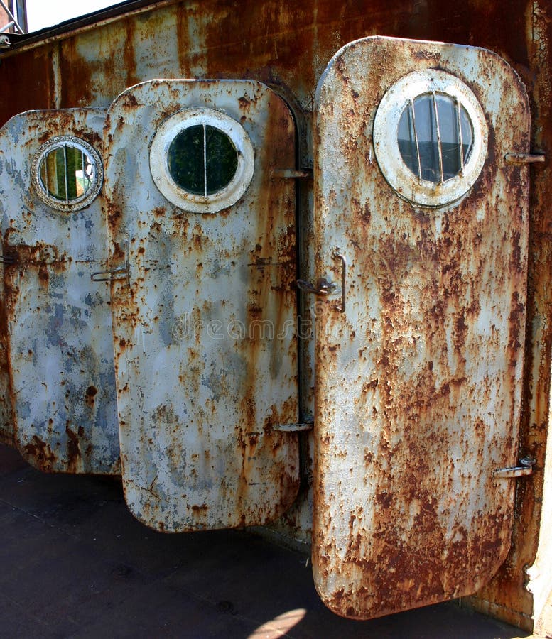 Old Rusted Doors with Portholes Stock Photo - Image of texture ...