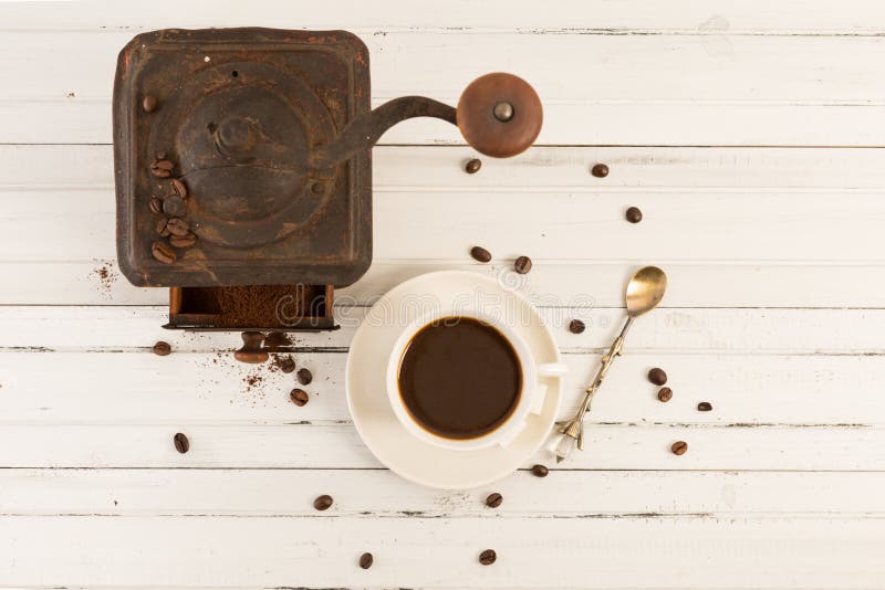 Old Rusted Grinder and Coffee Cup Stock Photo - Image of closeup ...