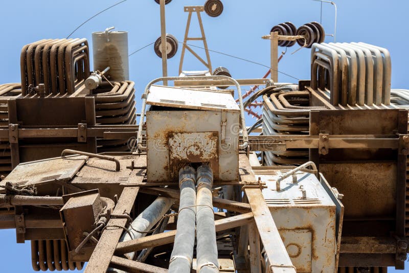 Old Rusted High Voltage Transformer Bottom View Stock Photo - Image of ...