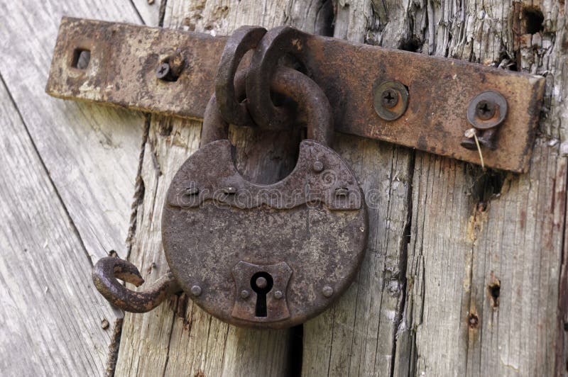 Old Rusted Lock on a Rustic Door with Decorative Natural Weathered Wood ...