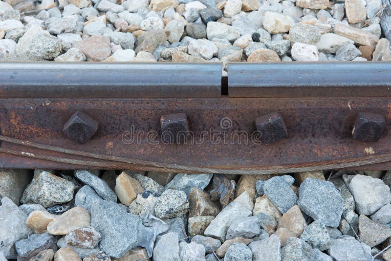Old Rusted on Railroad. Rusty Metal Rail Track Fixed on St Stock Photo ...