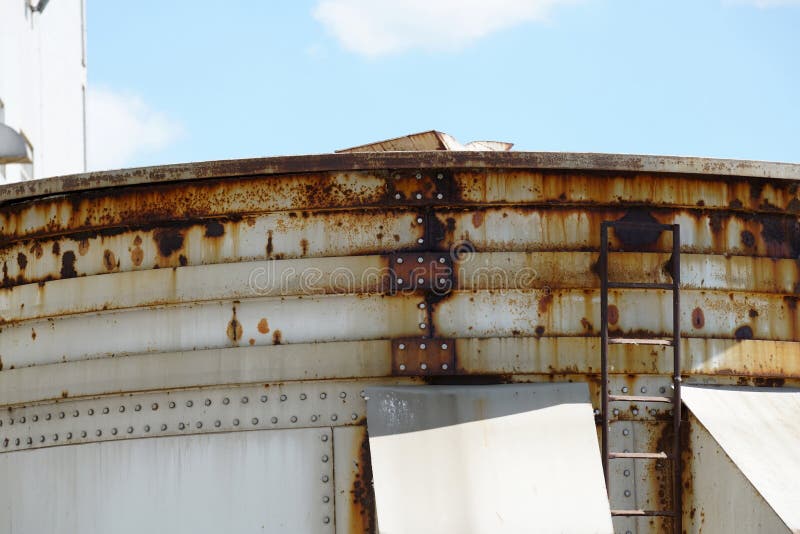An Old Rusted Silo Photographed in a Port Area in Summer Stock Photo ...
