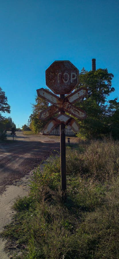 Rusted Ol Road Signs with Background Vegetation. Stock Image - Image of ...