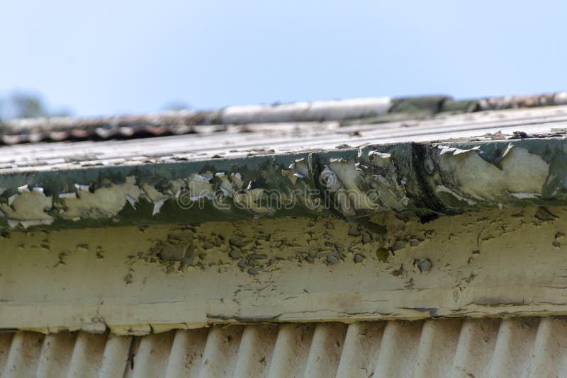 A Old Rusted Storage Unit Gutter Stock Photo - Image of grass, lines ...