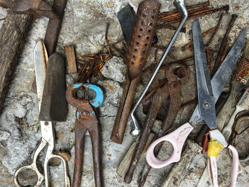 Old Rusted Tools Over Concrete Stock Photo - Image of building, vintage ...