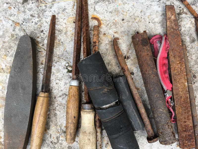 Old Rusted Tools Over Concrete Stock Photo - Image of device ...