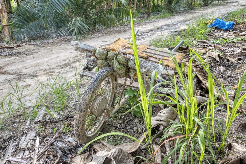 An Old Rusted Trolley with Motorcycle Wheel Stock Image - Image of ...