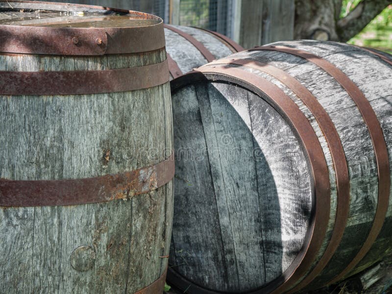 Old Rusted Wine Barrels Outside Stock Photo - Image of container, grey ...