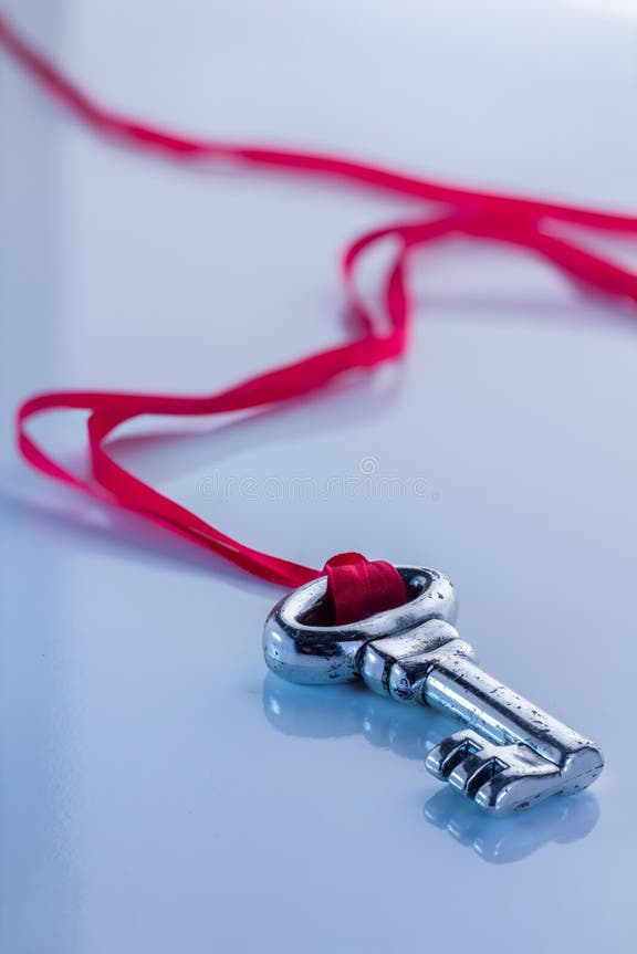 An Old Rustic Key with Red Ribbon Stock Photo - Image of concept, metal ...