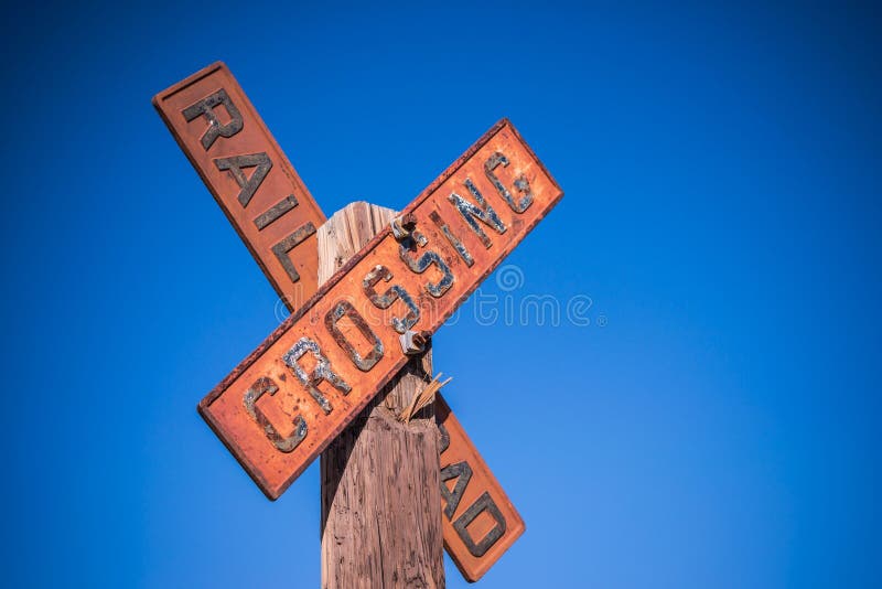 Old, Rustic Railroad Crossing Sign, Mounted on a Wooden Pole in a Rural ...