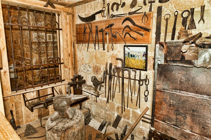 In old rustic smithy stock image. Image of group, anvil - 56011211