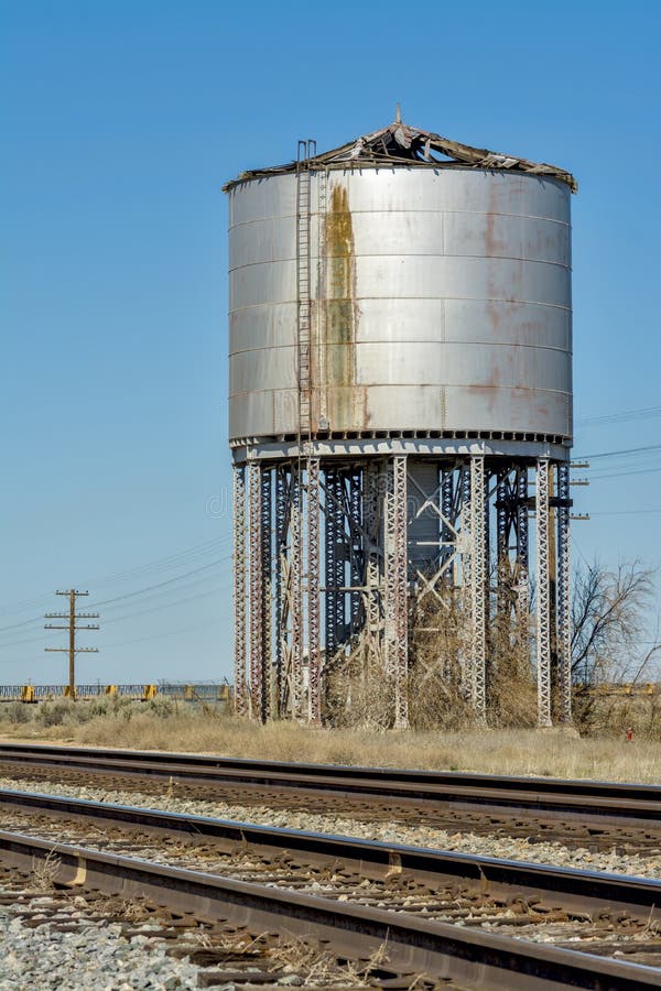 Old Rustic Water Tower Along a Railroad Stock Photo - Image of steel ...