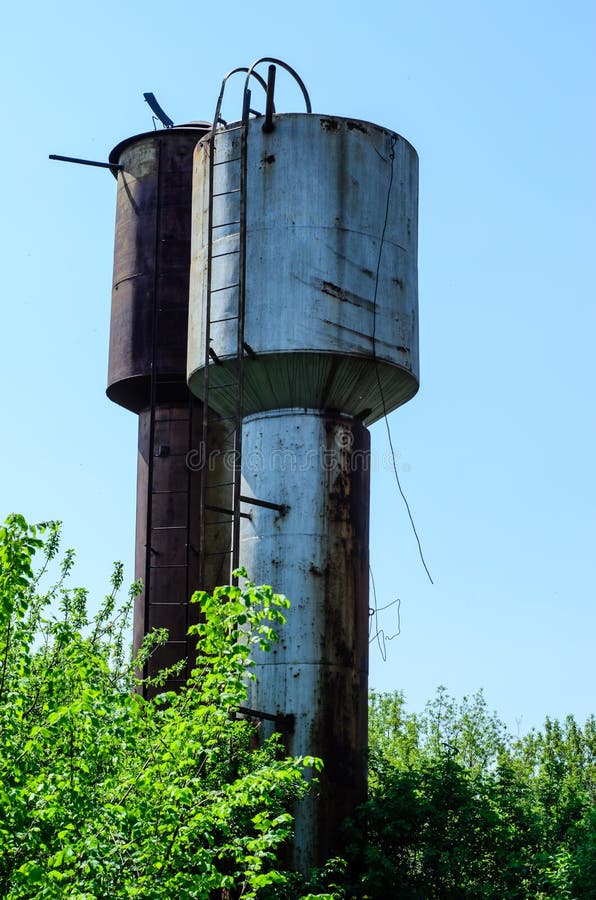 Old rustic water towers stock photo. Image of landscape - 236552690