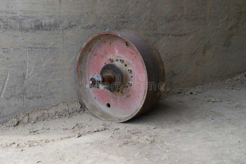 Old Rustic Wheel on the Ground Stock Photo - Image of surface ...