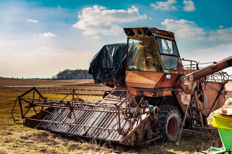 Old Rusty Abandoned Harvester on a Country Field Stock Image - Image of ...