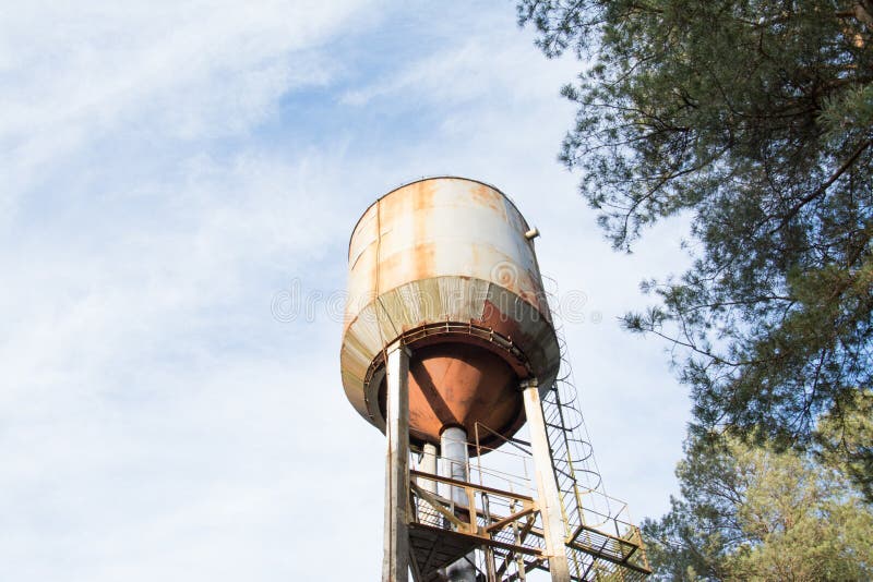 An Old Rusty Abandoned Water Tower Stock Photo - Image of round ...